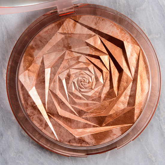 Huda Beauty Helios N.Y.M.P.H. All Over Highlighting Powder Review ...